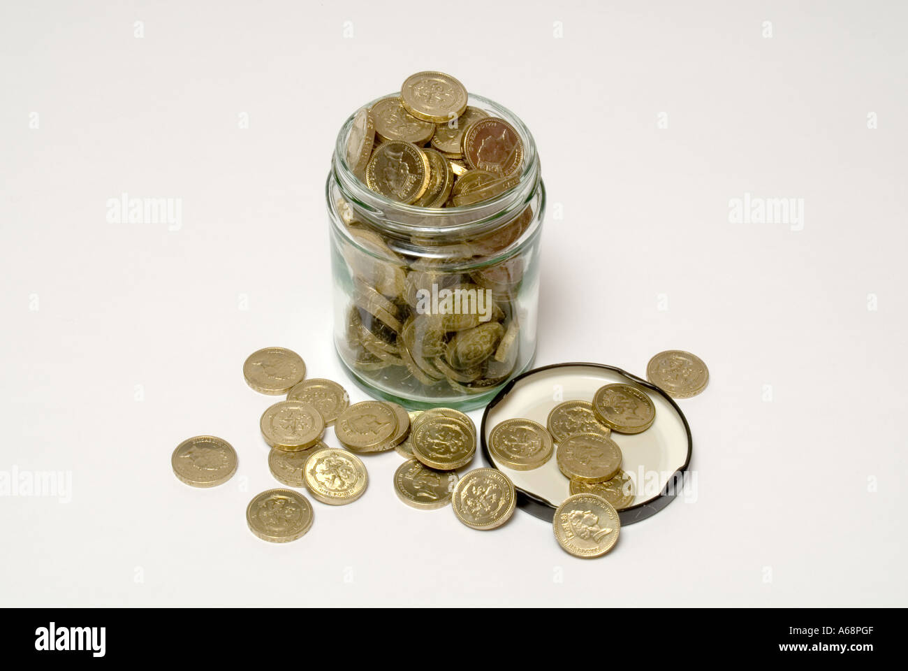 Storing and saving one pound sterling money currency in an overflowing ...