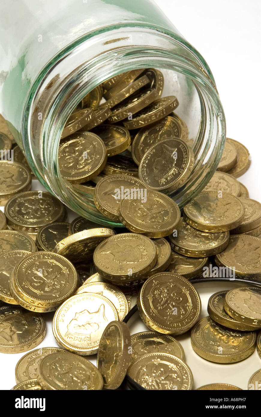 Money jar pounds coin coins cash pile hi-res stock photography and ...