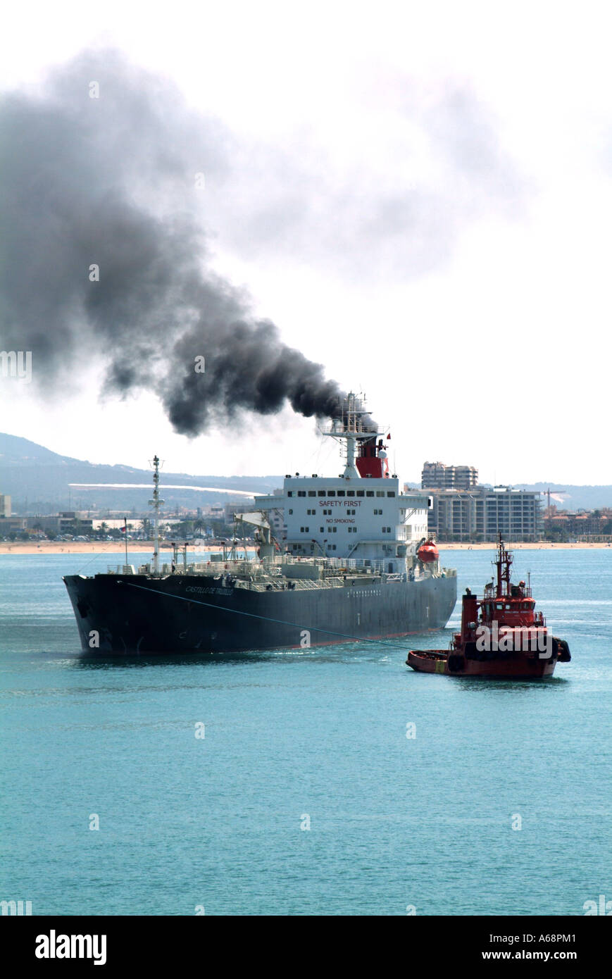 Back smoke & soot emissions belching out from funnel Cargo ship ...