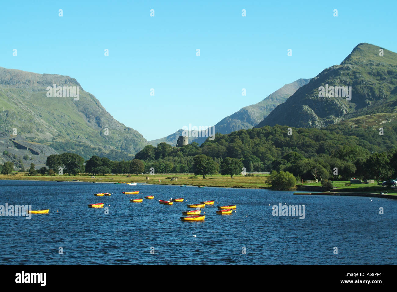 Llyn Padarn a moraine dammed glacially formed lake with rowing boats ...