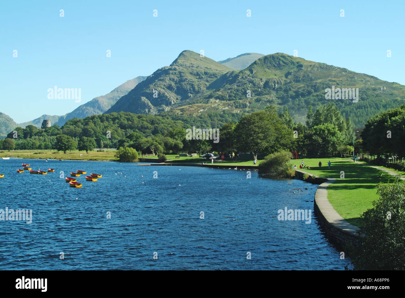 Llyn Padarn a moraine dammed glacially formed lake with rowing boats ...
