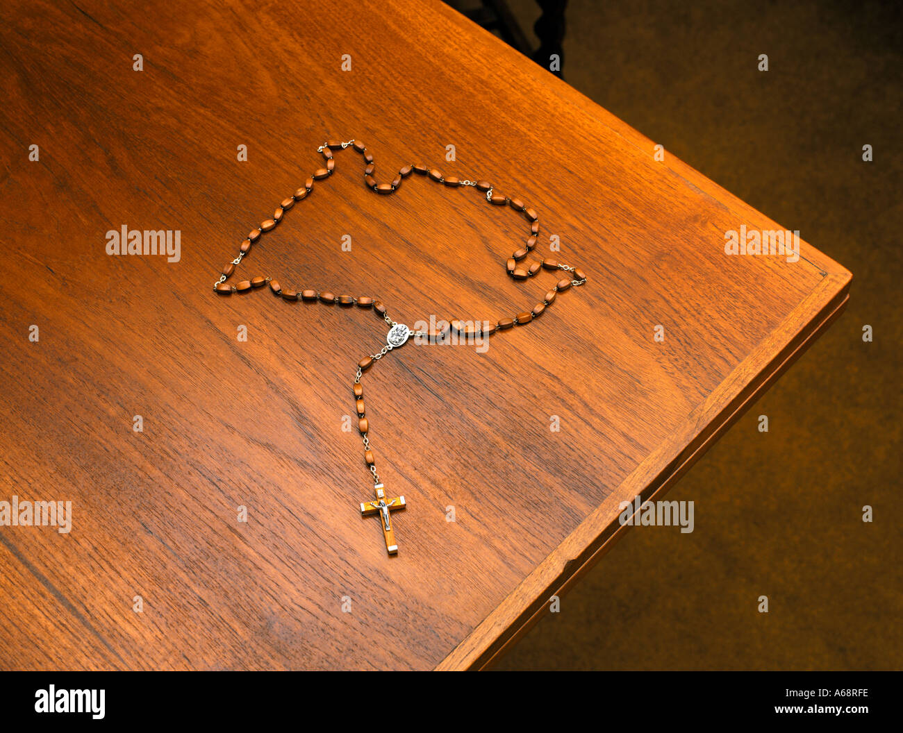 Rosary on cross hi-res stock photography and images - Alamy