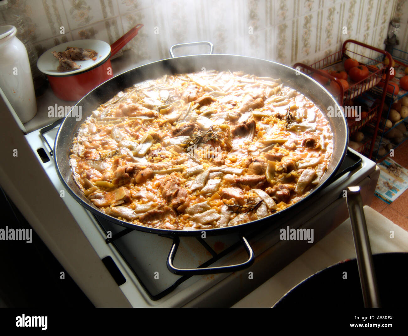 Cooking paella. Traditional meal from Valencian Community. Spain Stock ...