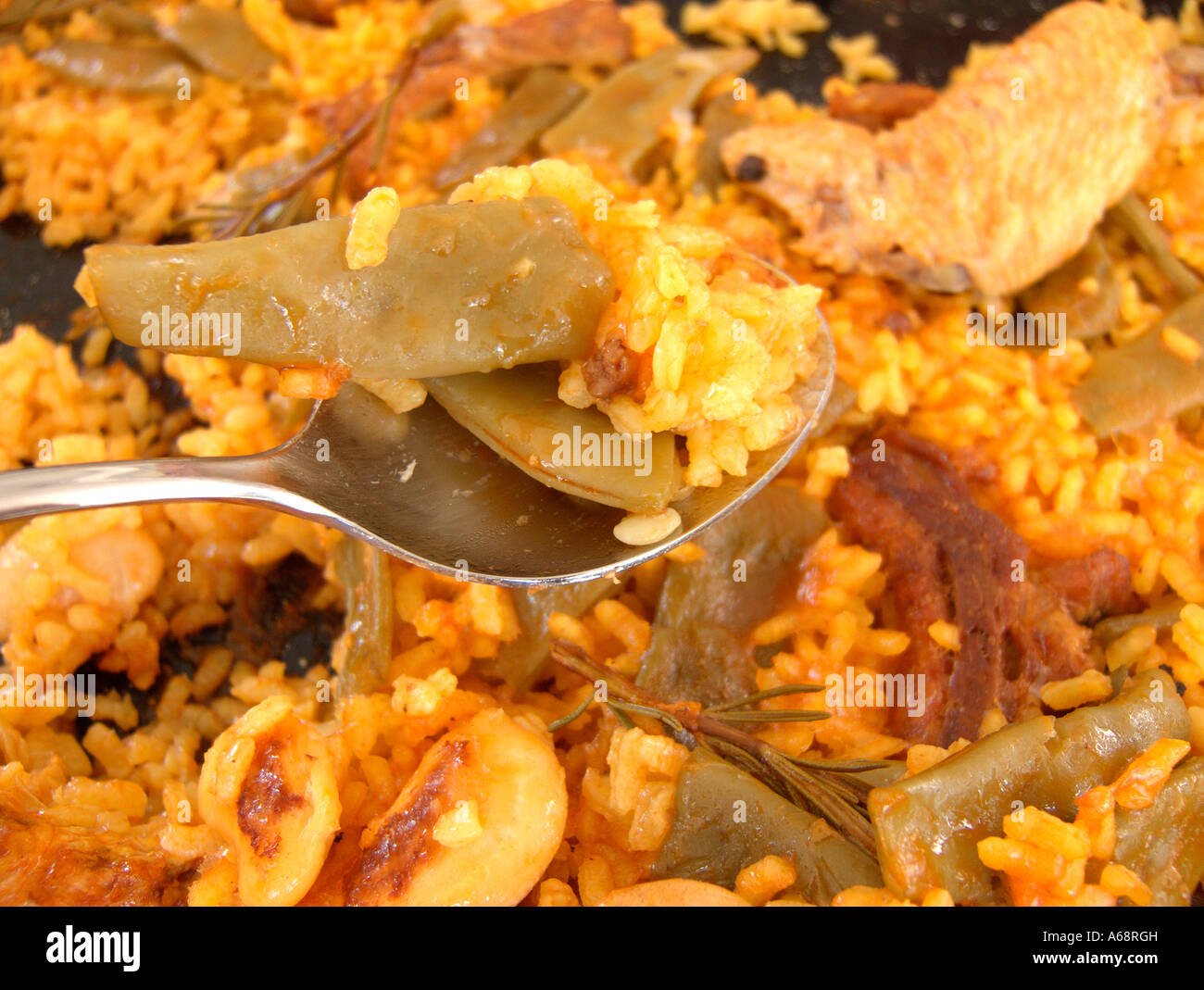 Eating paella. Traditional dish from Valencia. Spain Stock Photo - Alamy
