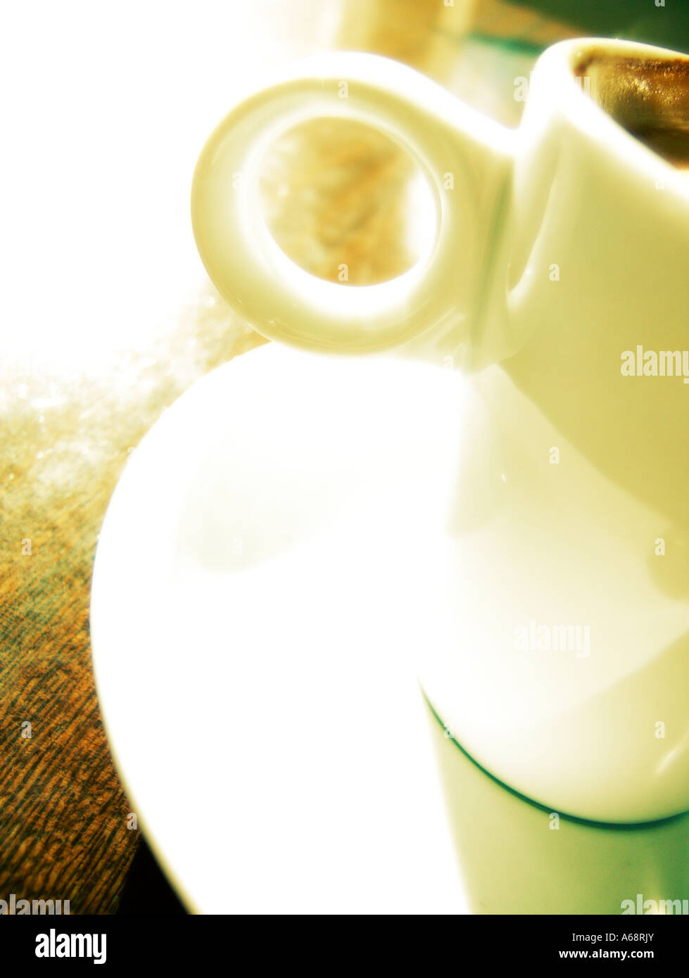 Detail of a coffee cup handle Stock Photo - Alamy