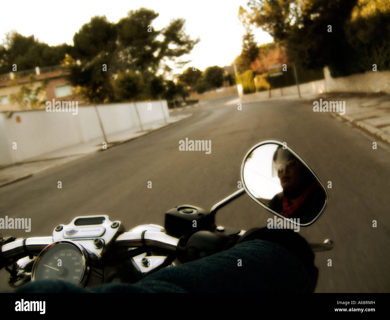 Motorbike rider residential street hi-res stock photography and images ...