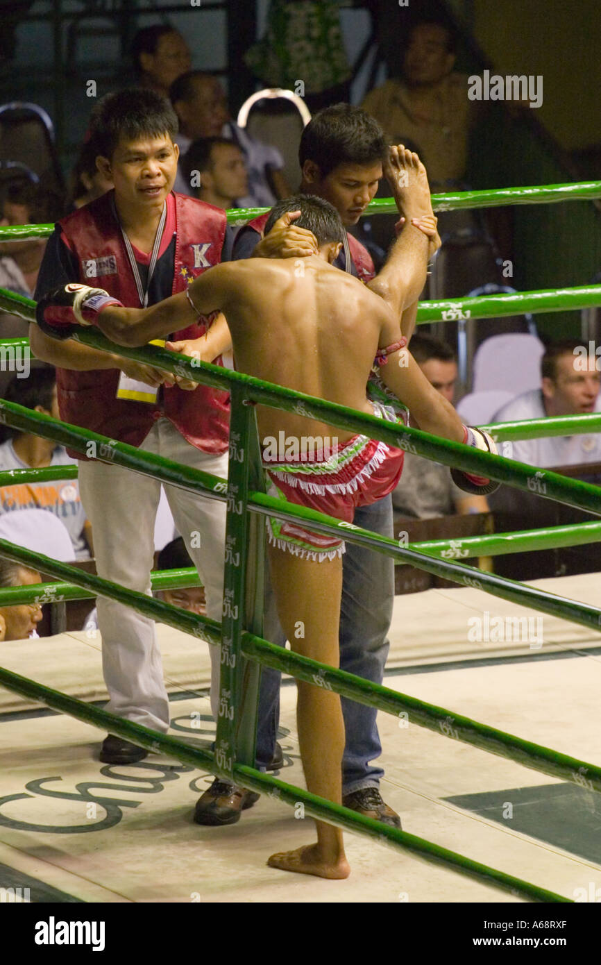Fighter stretching before a Muay Thai fight (Rajadamnern stadium ...