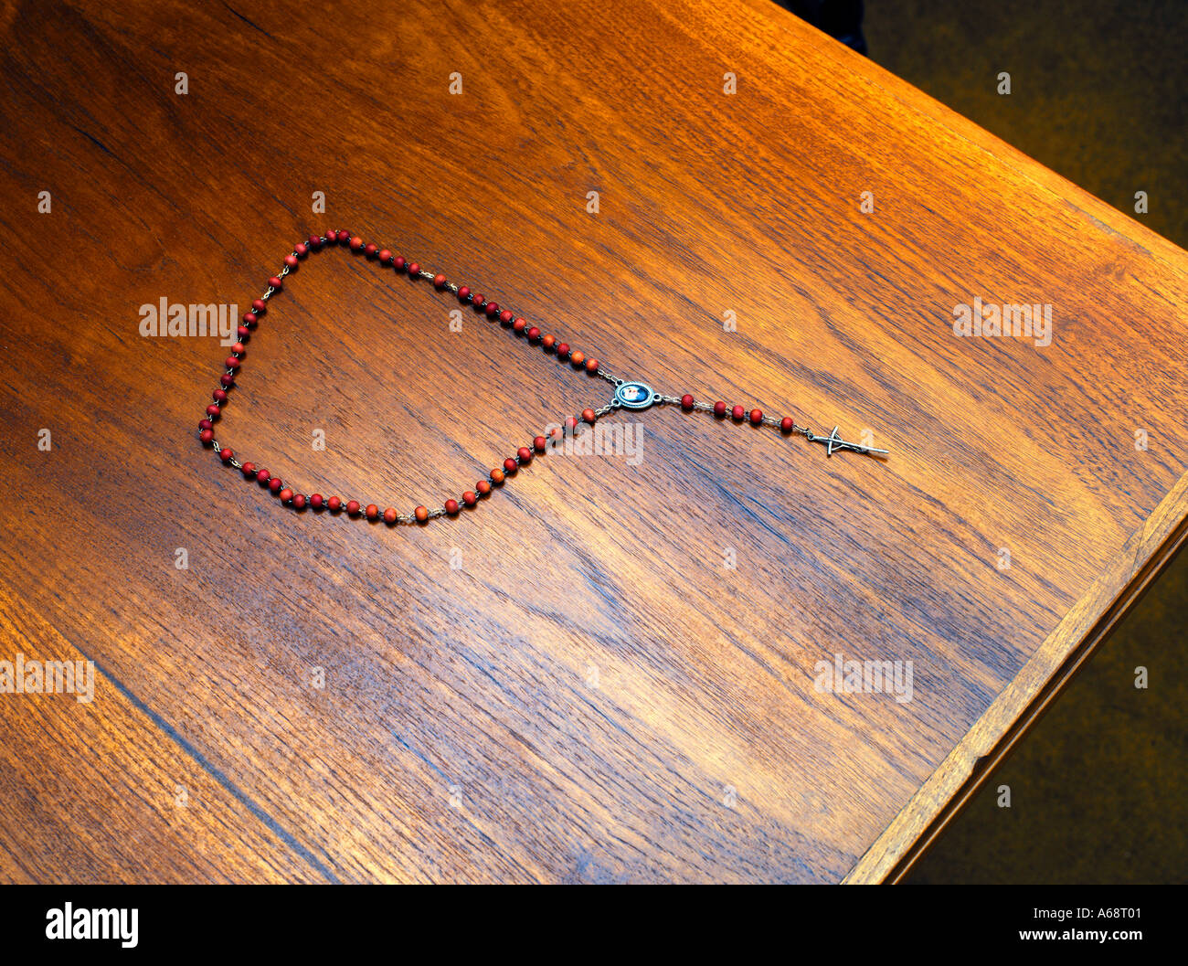 Rosary on cross hi-res stock photography and images - Alamy