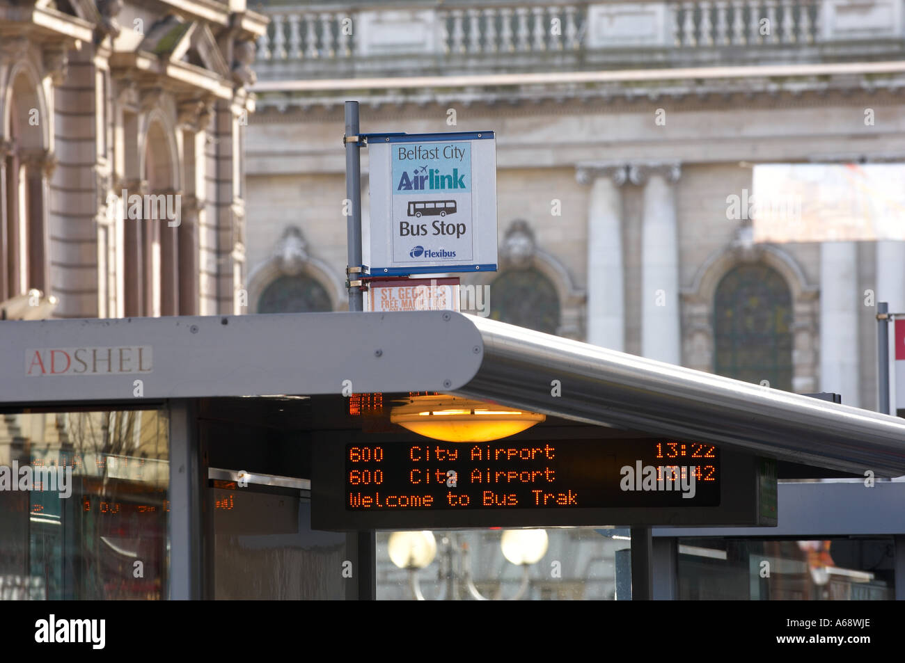 Bus stop across the road from Belfast City Hall Northern Ireland Stock ...