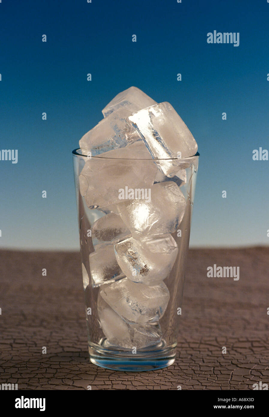 Glass full of ice Stock Photo - Alamy