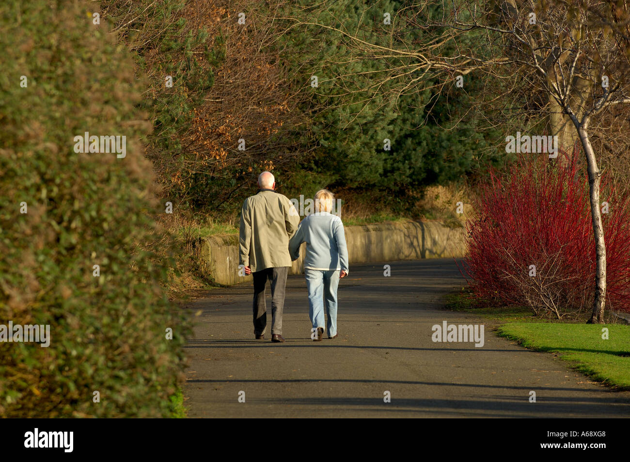 Couple out for a stroll through Victoria Park Belfast Stock Photo - Alamy