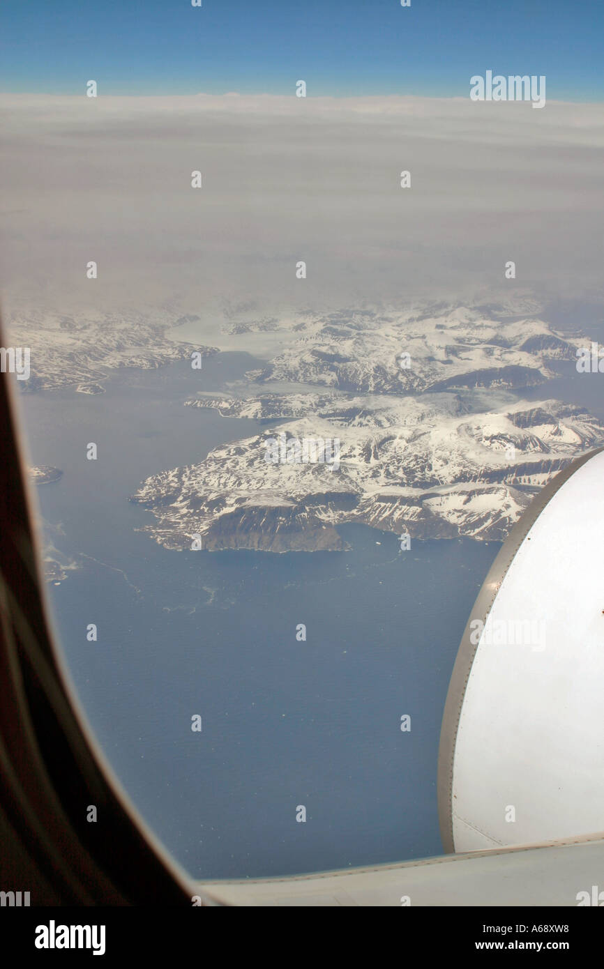 Airplane flying over Atlantic Ocean between Greenland and Labrador ...