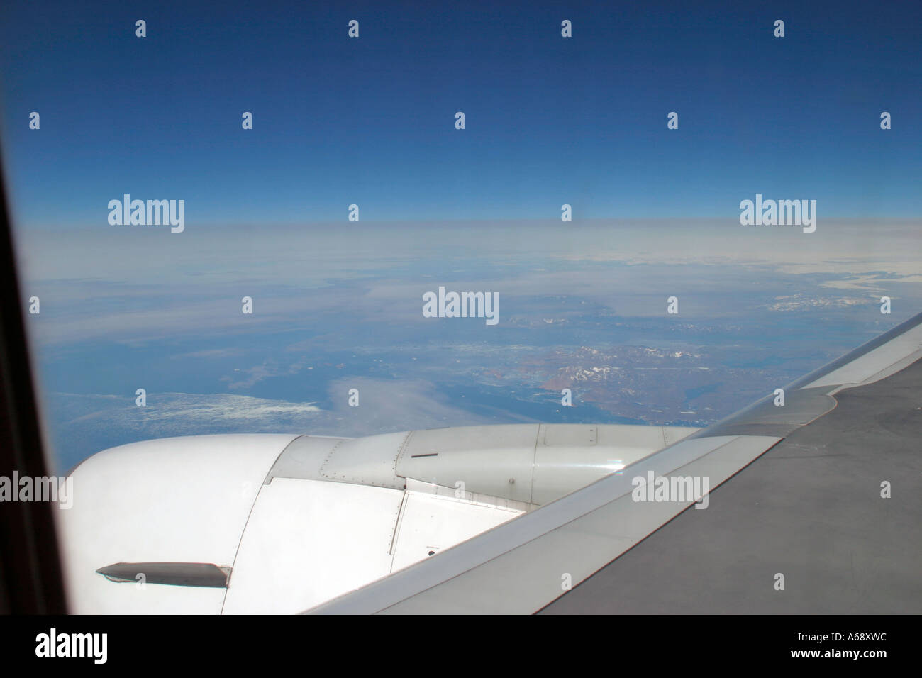 Airplane flying over Atlantic Ocean between Greenland and Labrador ...