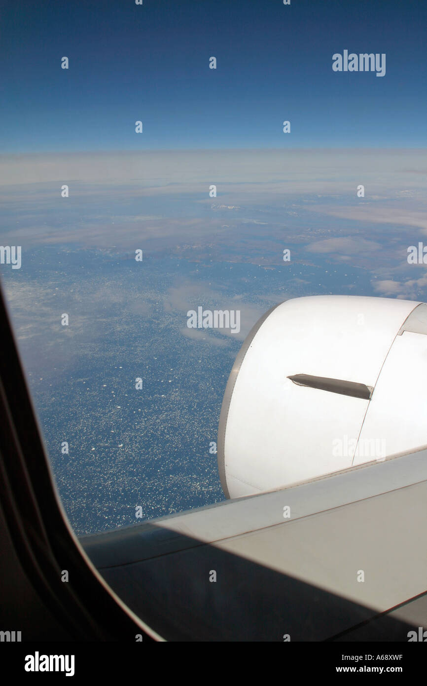 Airplane flying over Atlantic Ocean between Greenland and Labrador ...