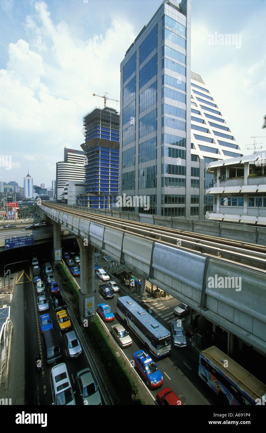 A skytrain monorail viewed from Phloen Chit Station runs above the ...