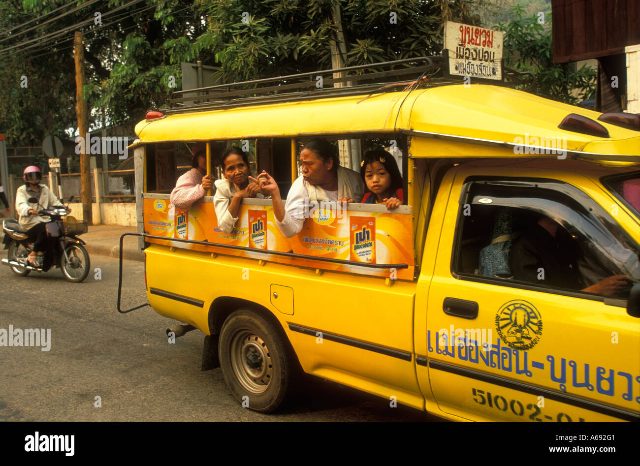 A songtaew a pickup converted into a taxi on the streets of Mae Hong ...