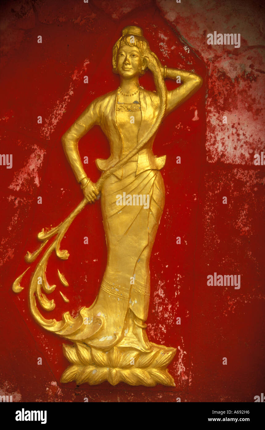 A long haired Visaka a legendary Buddhist being is carved onto the ...