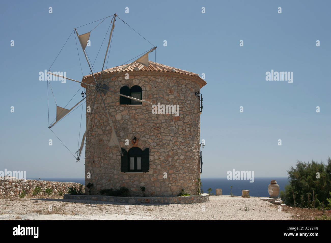 [Cape Skinari] windmill house with traditional sails and [sea view ...