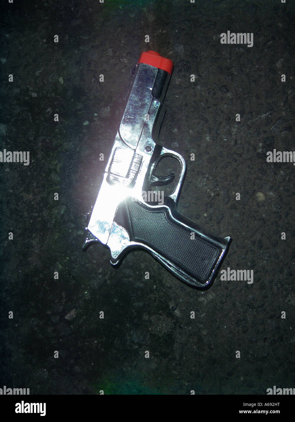 Still Life of Toy Gun in the Street Copy Space Stock Photo - Alamy
