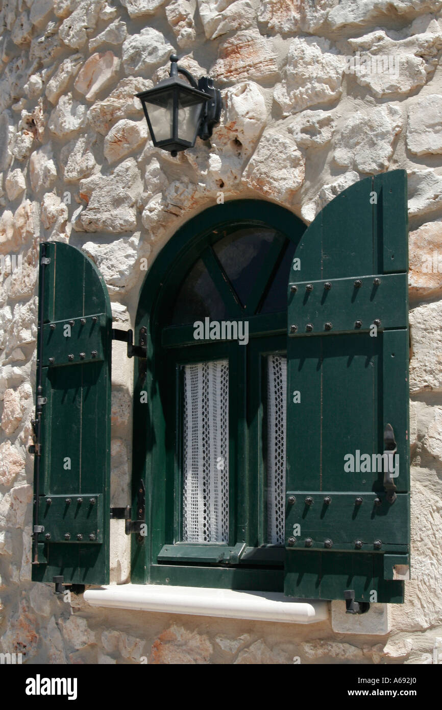 [Cape Skinari] windmill house, window and [open shutters], "close up ...