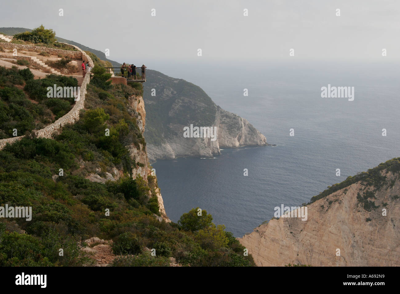 Tourists standing on [cliff top] viewing platform high above famous ...