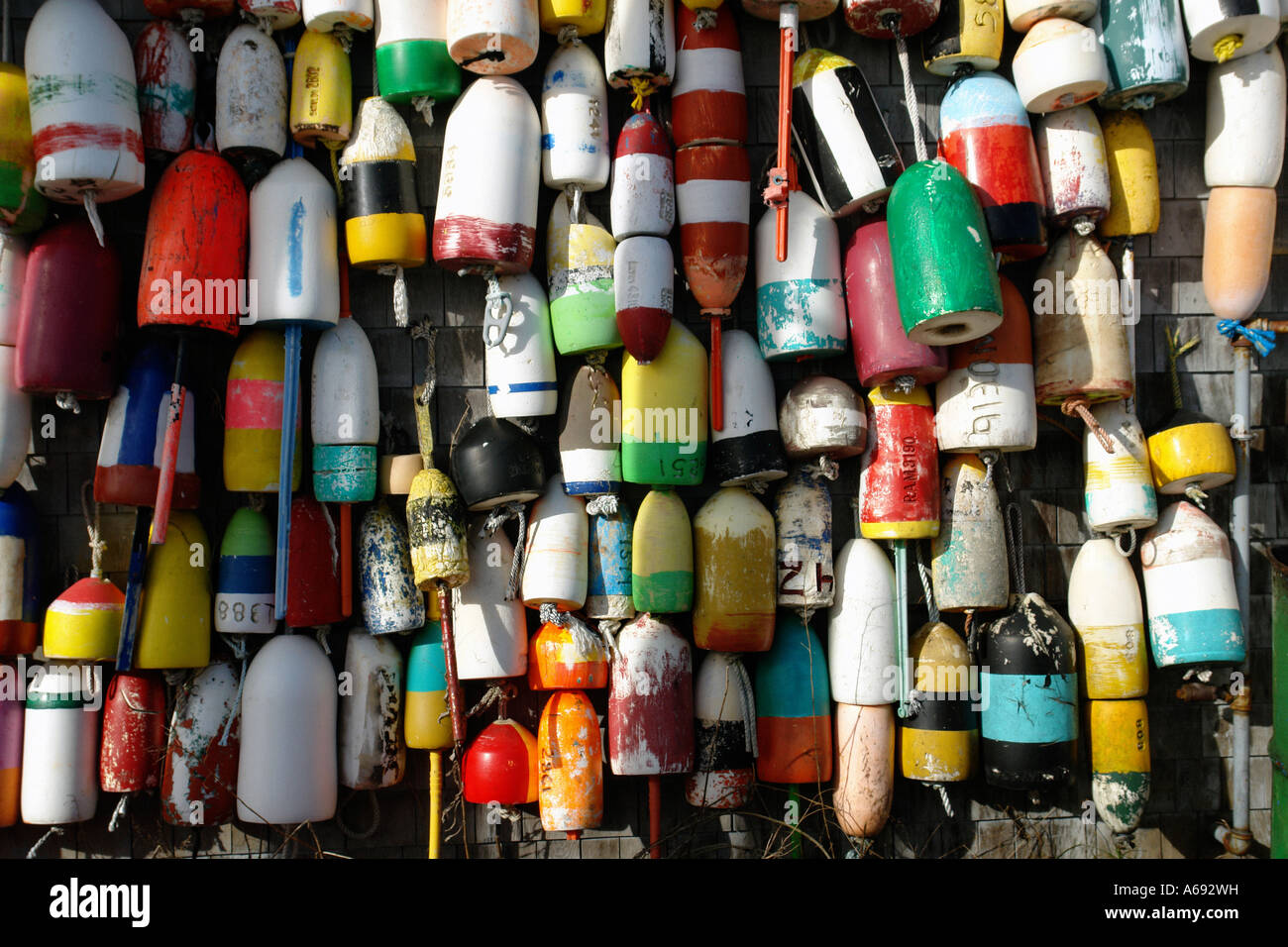 Colorful Nautical Buoys Hanging on The Side Of A Building Stock Photo ...