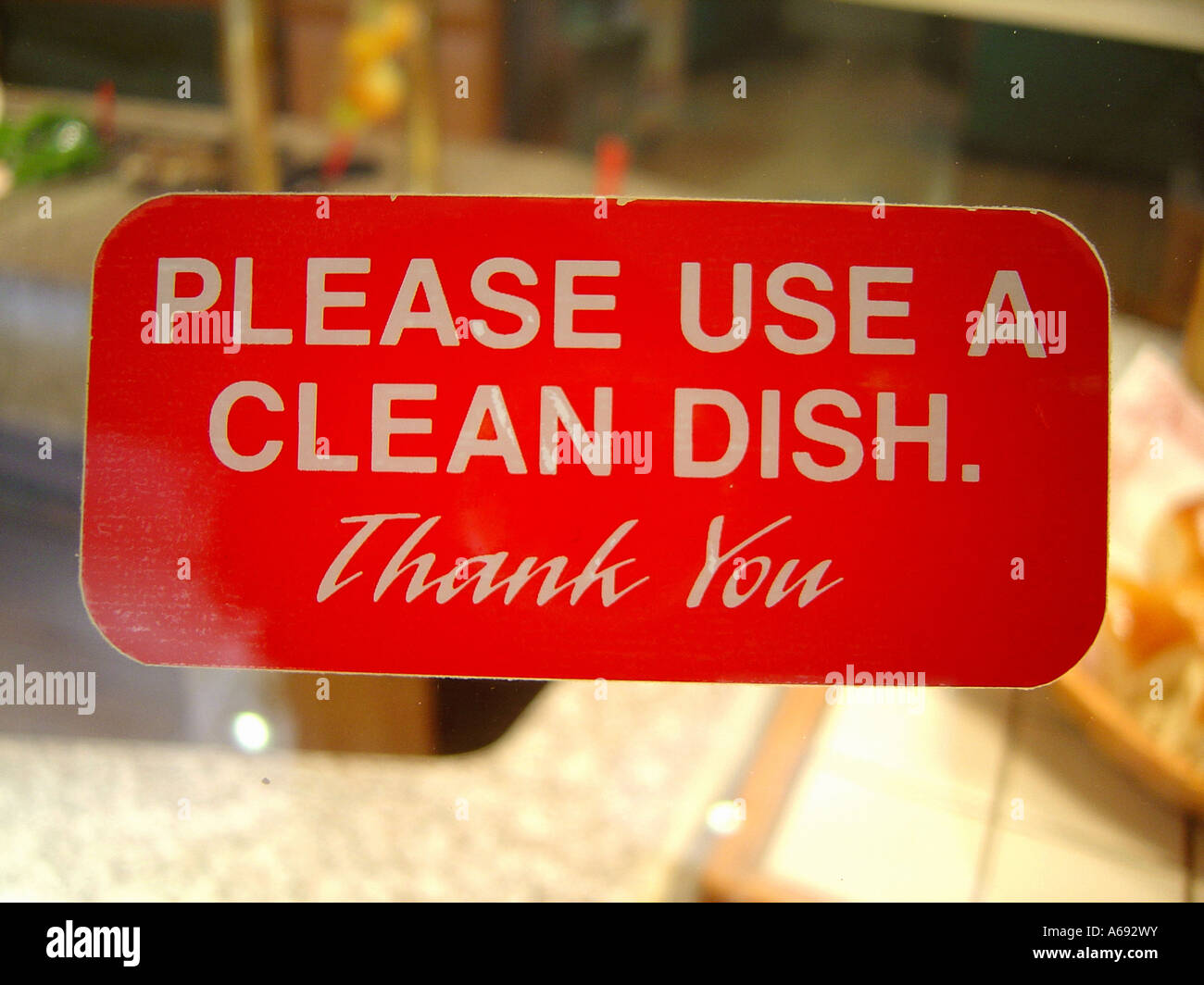 Please Use a Clean Dish Sign on the Glass Sneeze Guard at an All You ...