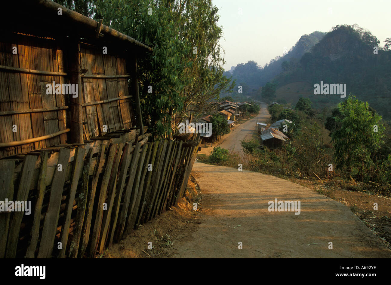 Dirt road and houses of the Lahu village of Ban Ja Bo Mae Hong Son ...