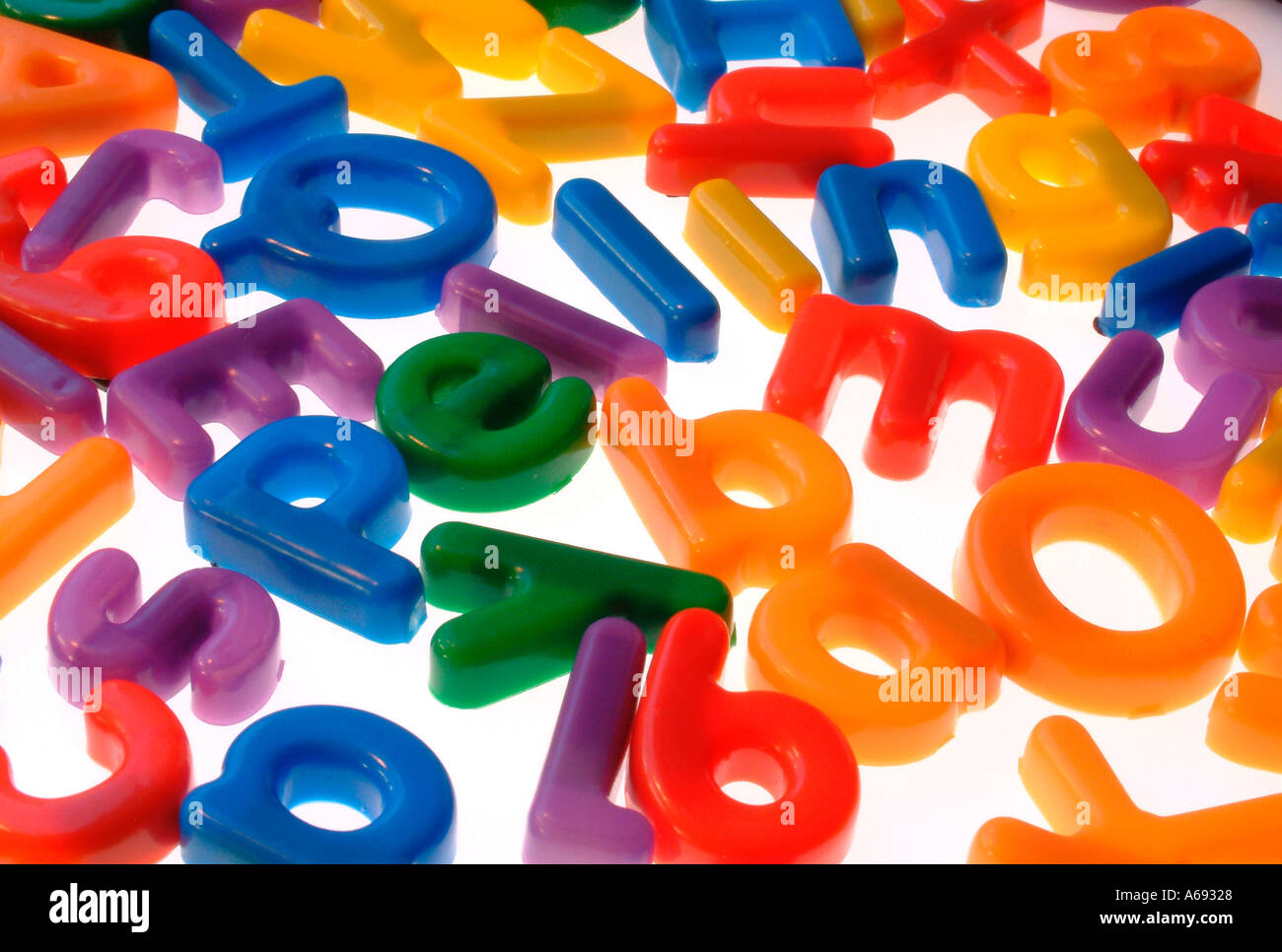 Childs magnetic letters spelling Stock Photo - Alamy
