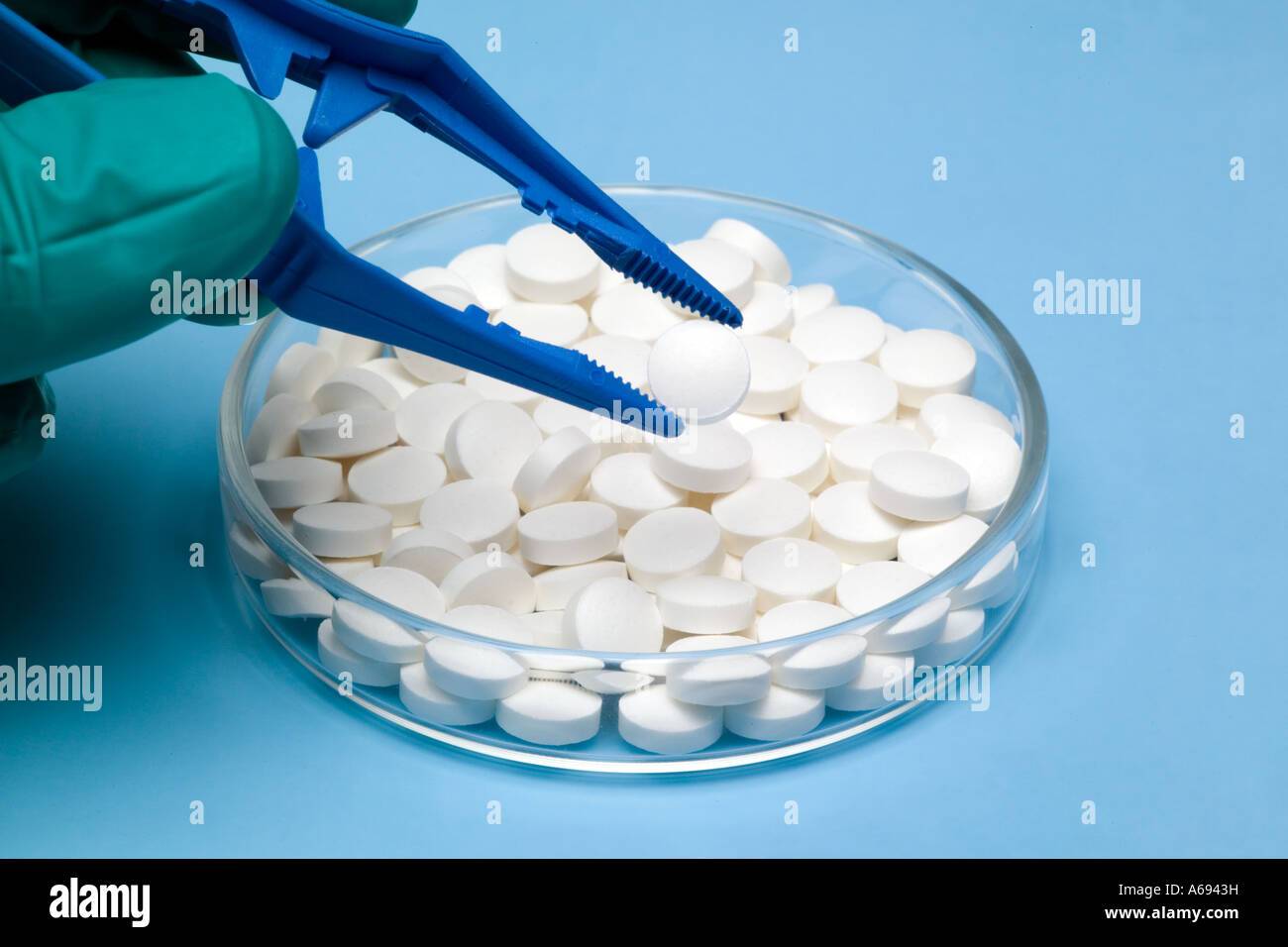 Suspect illegal drug tablets ready for lab analysis Stock Photo - Alamy