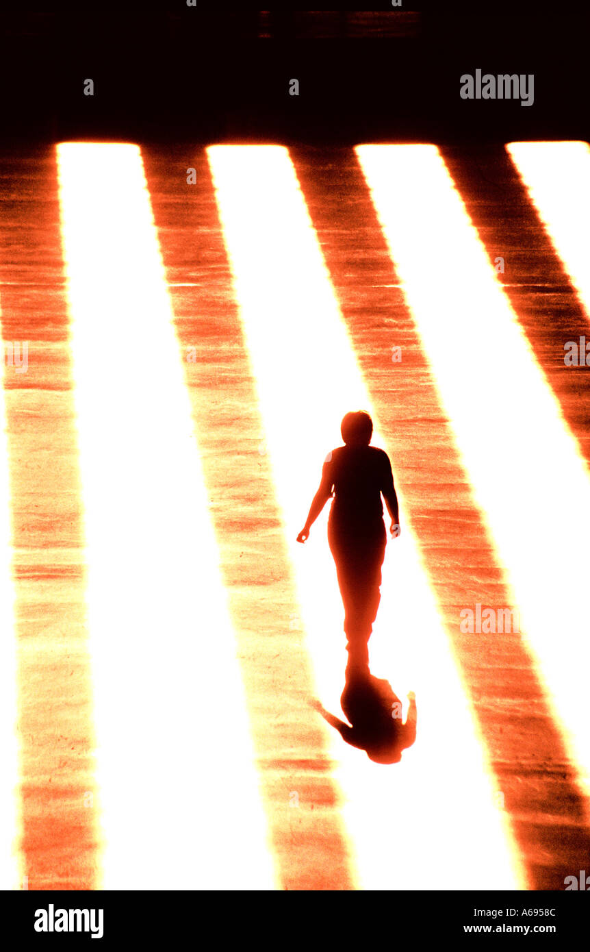 Back lit silhouettes of people Stock Photo - Alamy