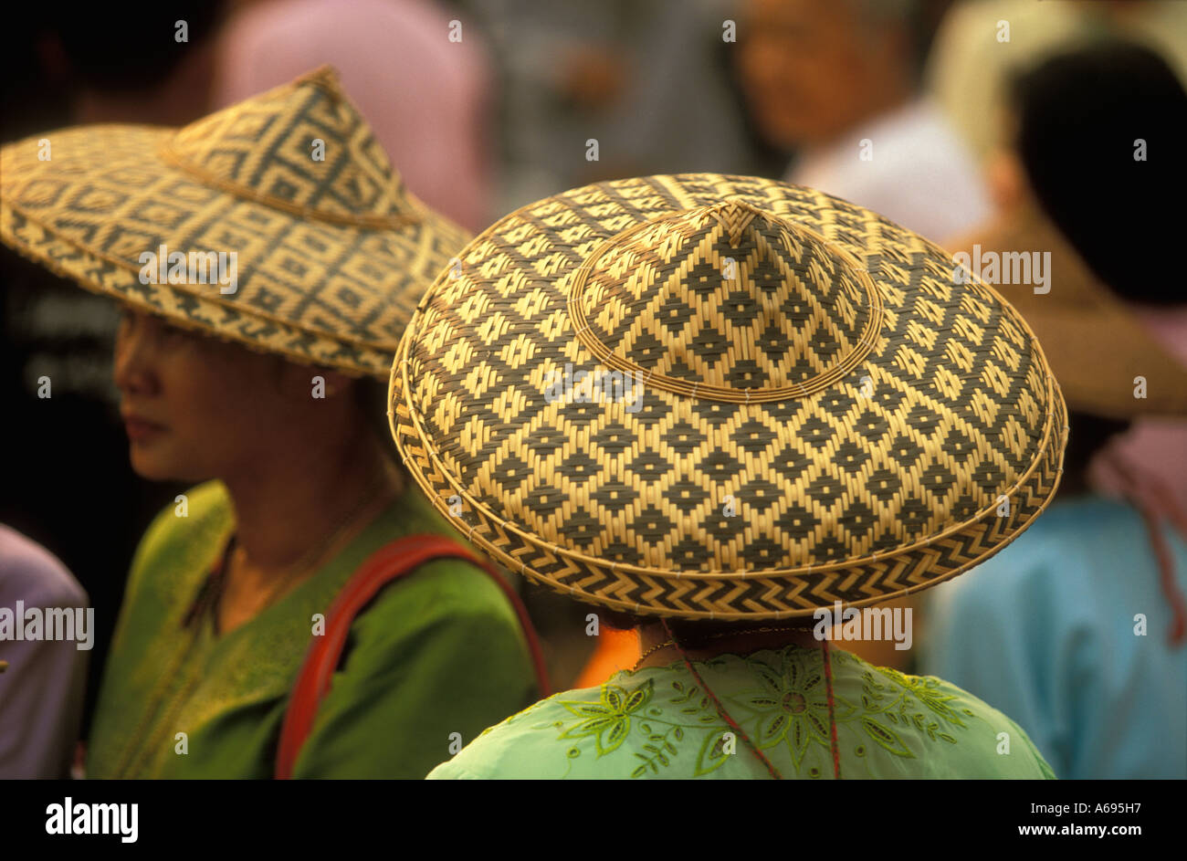 Shan women wear traditional bamboo hats at Poy Sang Long the yearly ...