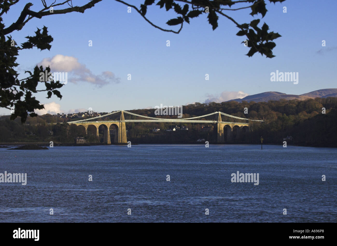 The Menai Bridge spanning the Menai Strait between Anglesey and the ...