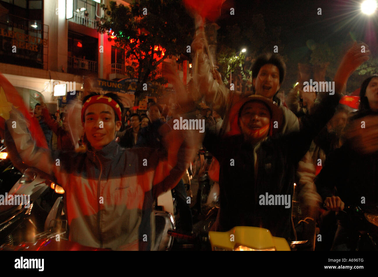 Vietnamese fans are celebrating the soccer victory of Vietnam in the ...