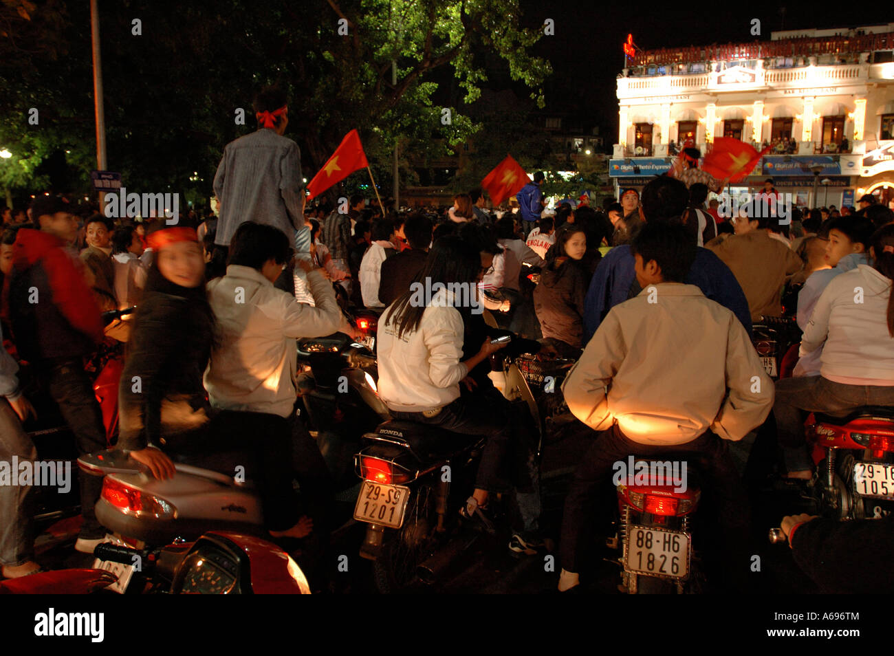 Vietnamese fans are celebrating the soccer victory of Vietnam in the ...