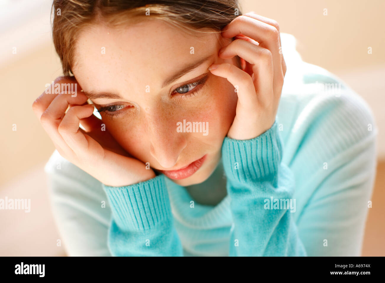 Sad looking girl Stock Photo - Alamy