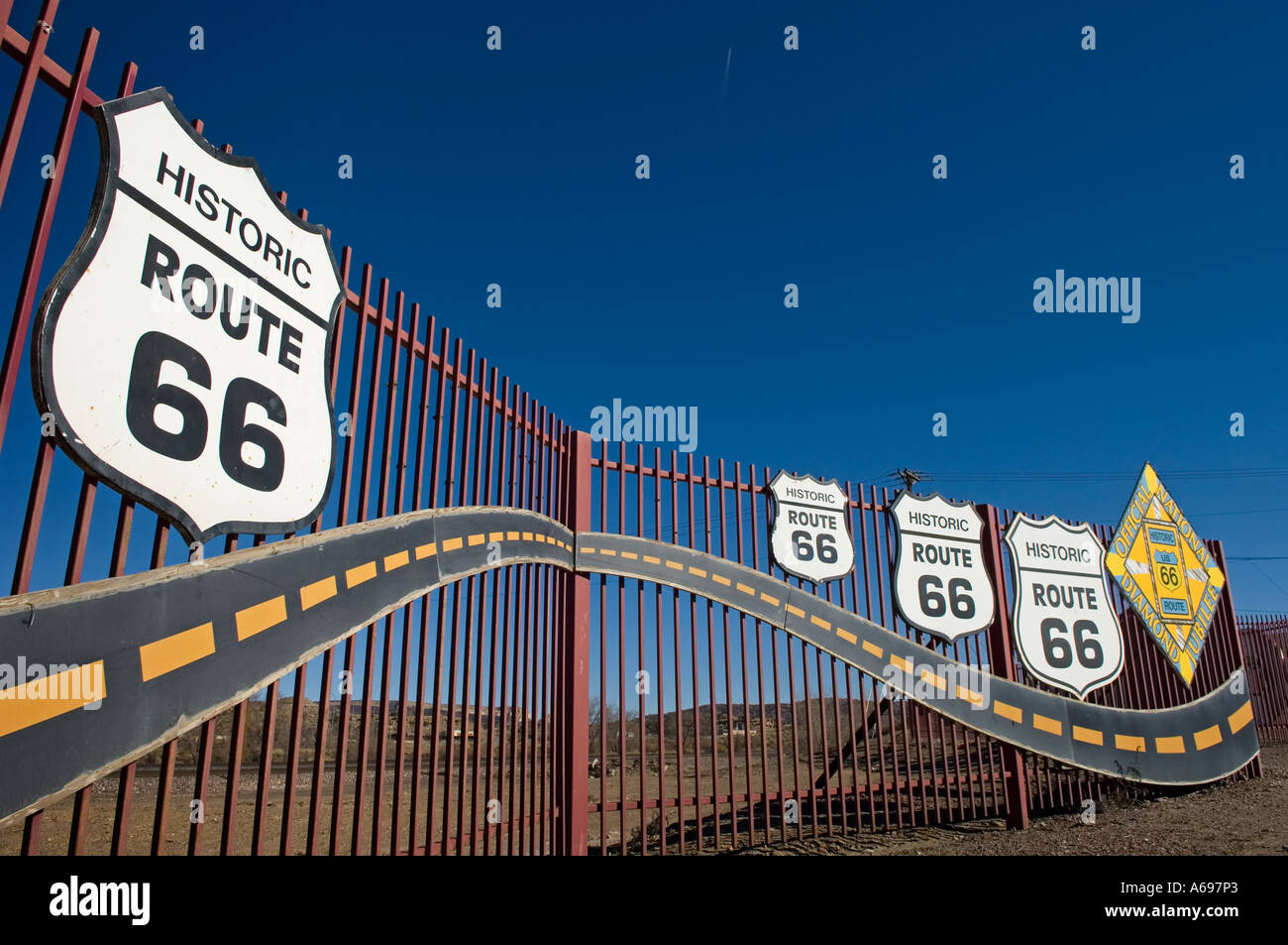 Historic Route 66 signs on fence in Gallup New Mexico Stock Photo - Alamy