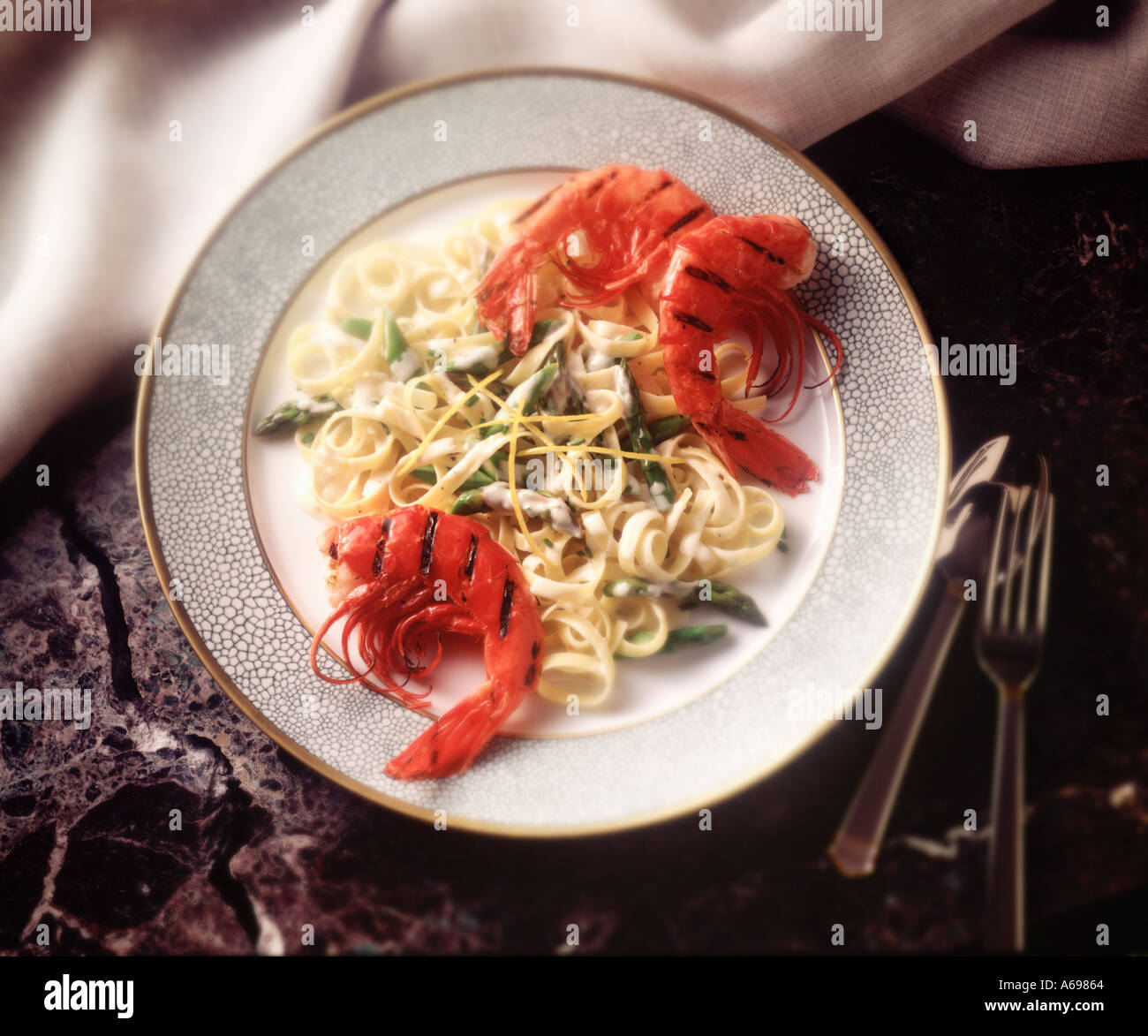 linguini and mediterranean prawns Stock Photo - Alamy