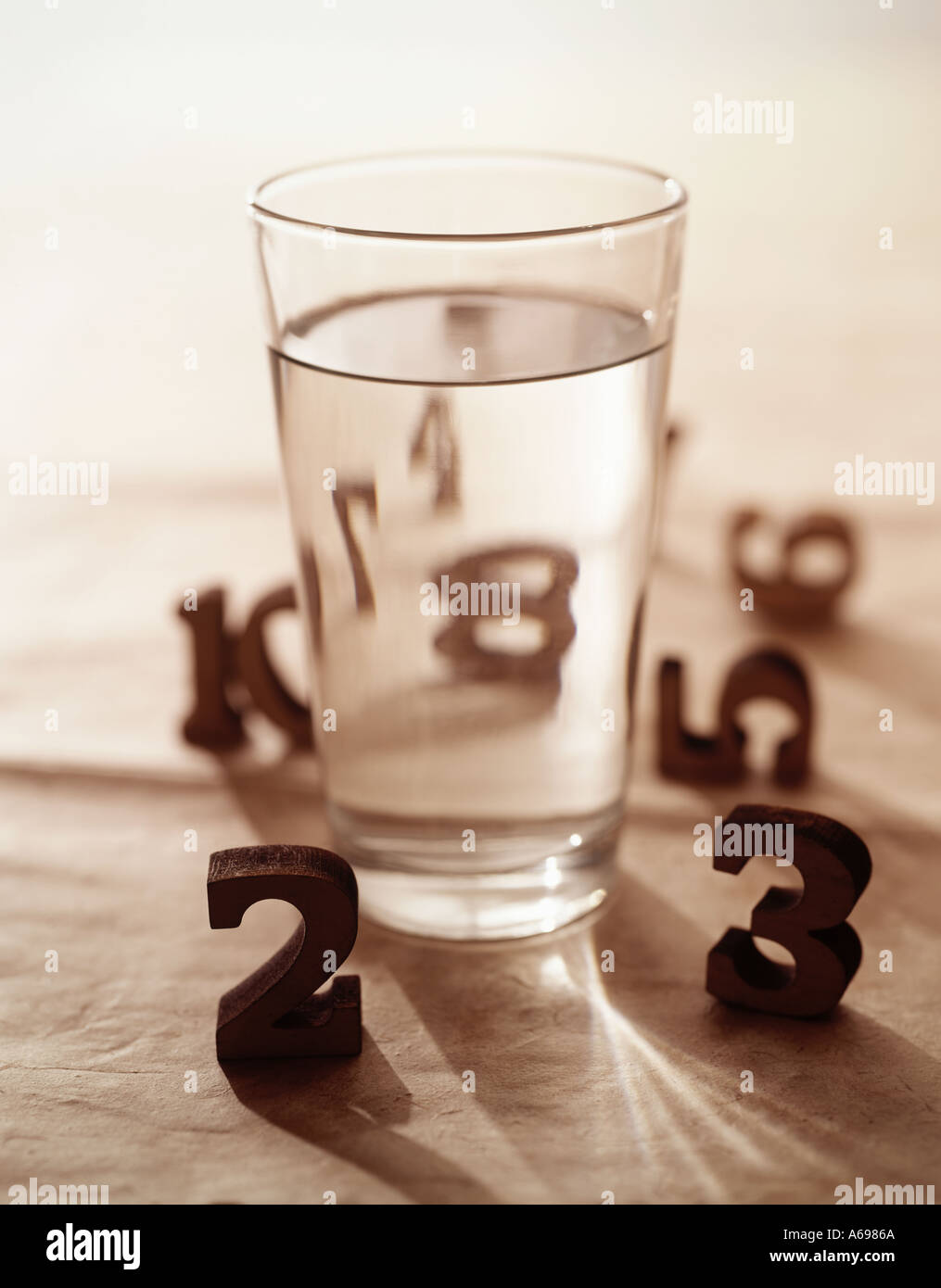 water glass and numbers Stock Photo - Alamy
