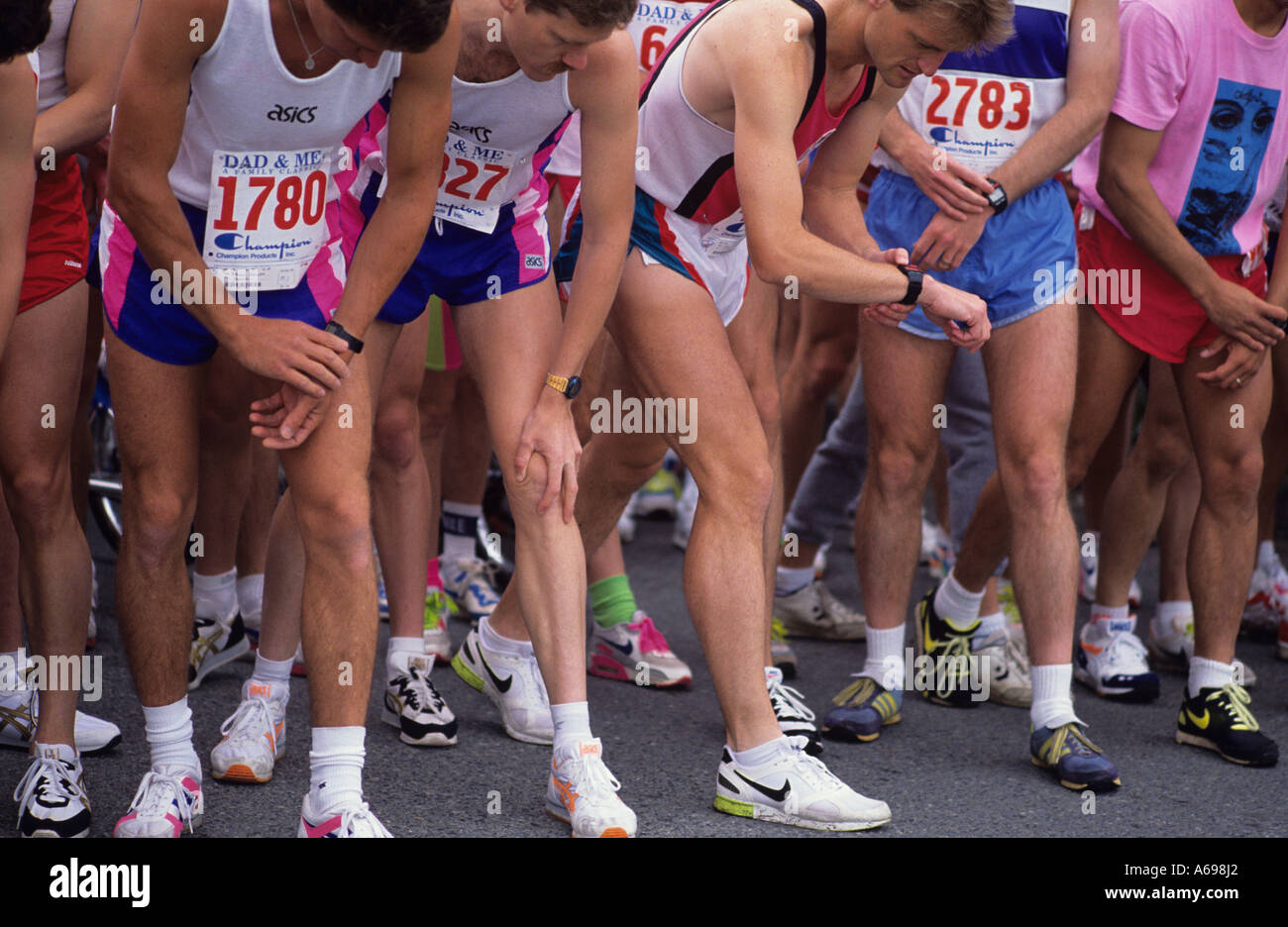 Retro image of Dad and Me fun run starting race with runners congested ...