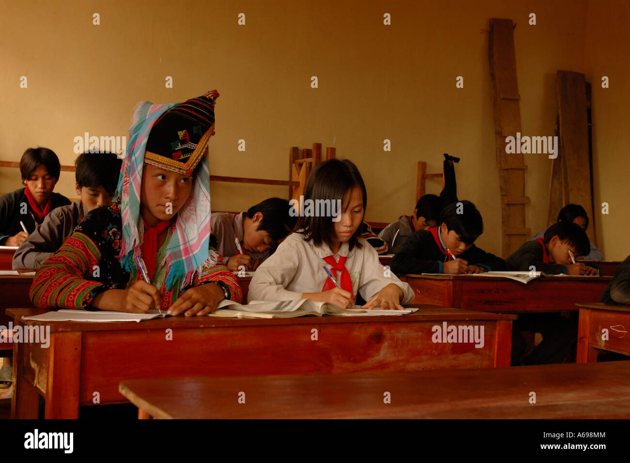 Blue Hmong indigenous girl dressed in colorful traditional clothing ...