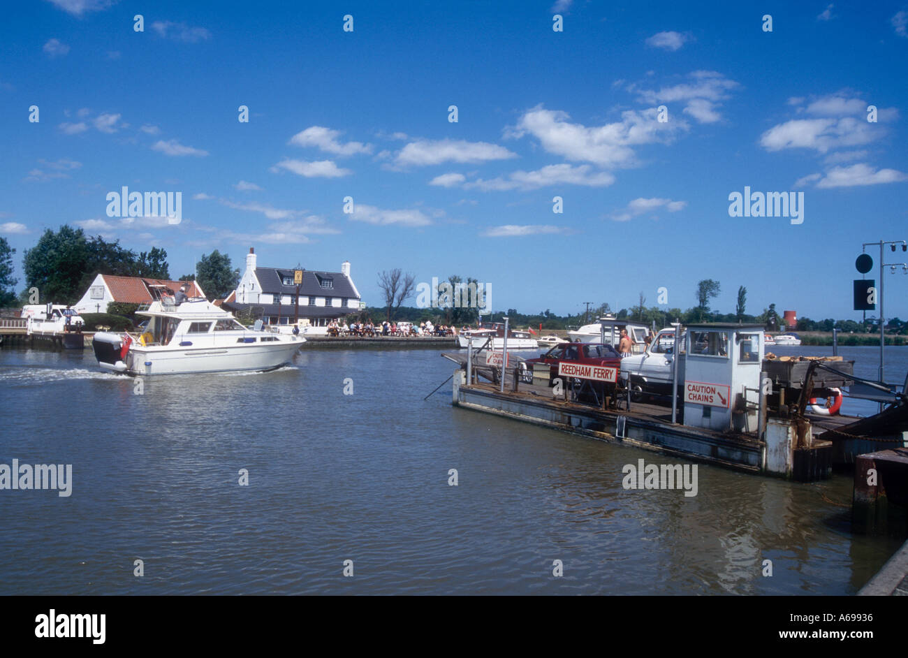 The chain ferry across the River Yare at Reedham on the Norfolk Broads ...