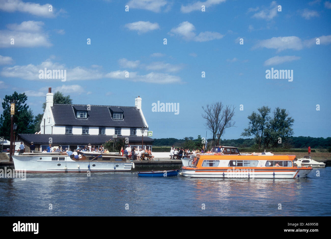 Boats by the Ferry Inn at Reedham on the River Yare Norfolk Broads ...