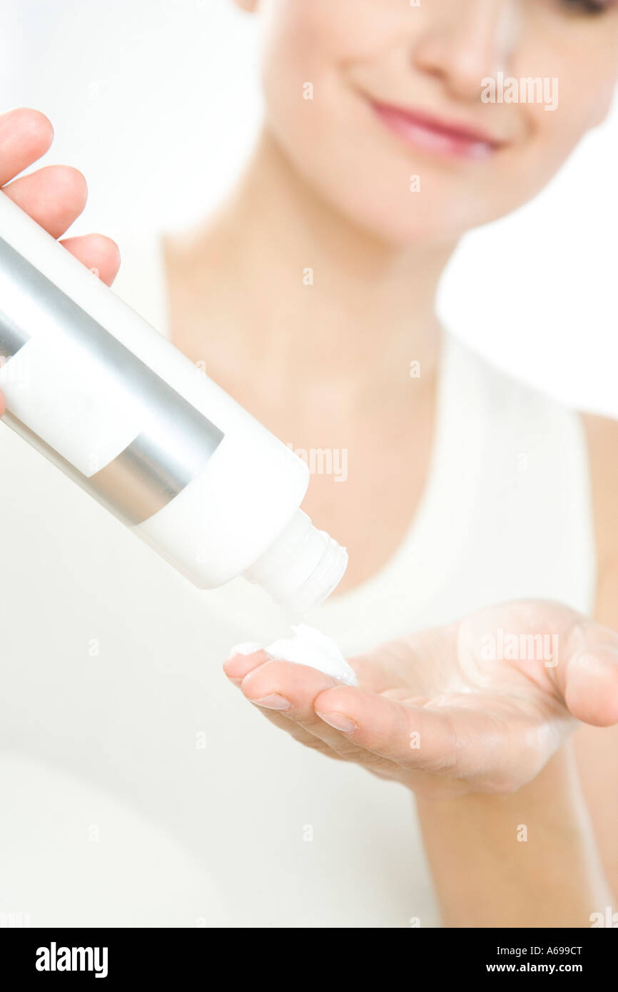 woman applying cream Stock Photo - Alamy