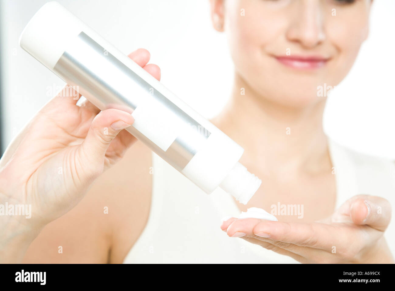 woman applying cream Stock Photo - Alamy