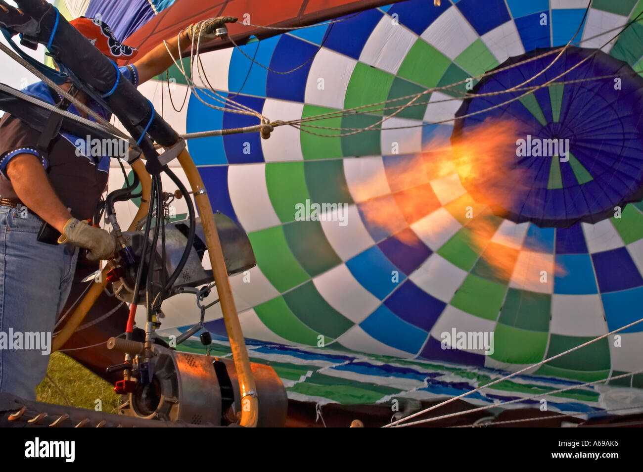 Inflating an air balloon with hot air with help of gas-jet Stock Photo ...