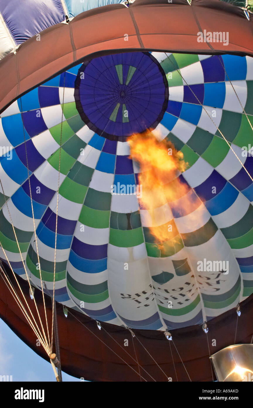 Inflating an air balloon with hot air with help of gas-jet Stock Photo ...