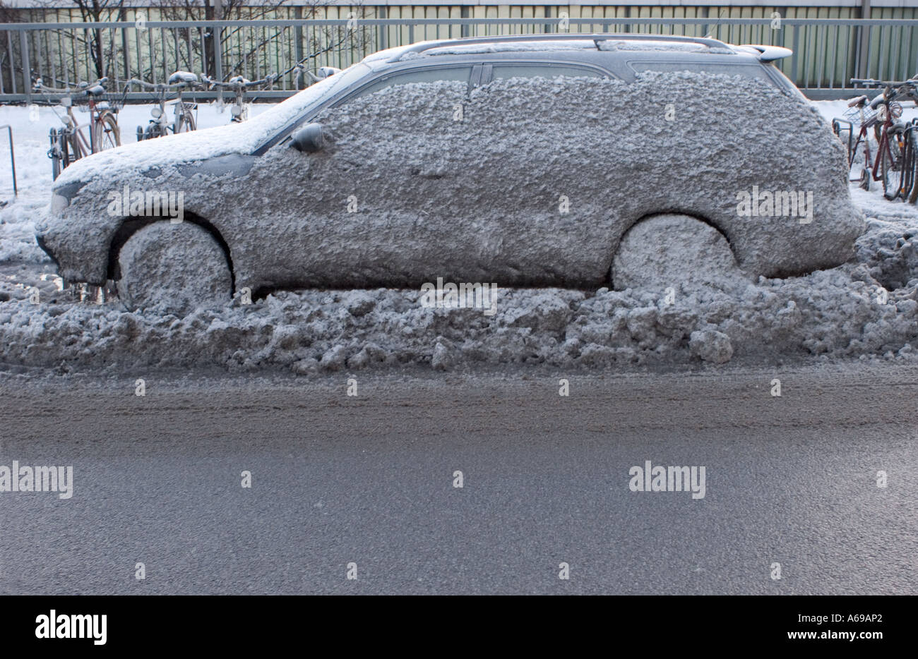 parked car covered with slush Munich Germany Stock Photo - Alamy