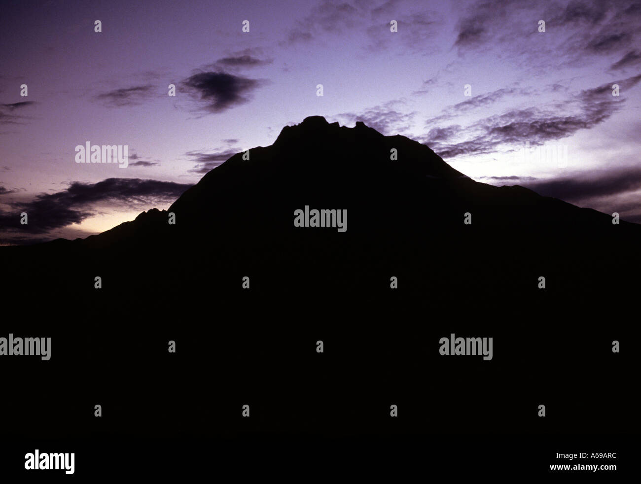 Mount Kinabalu in silhouette and sunset. Kinabalu National Park, Sabah ...