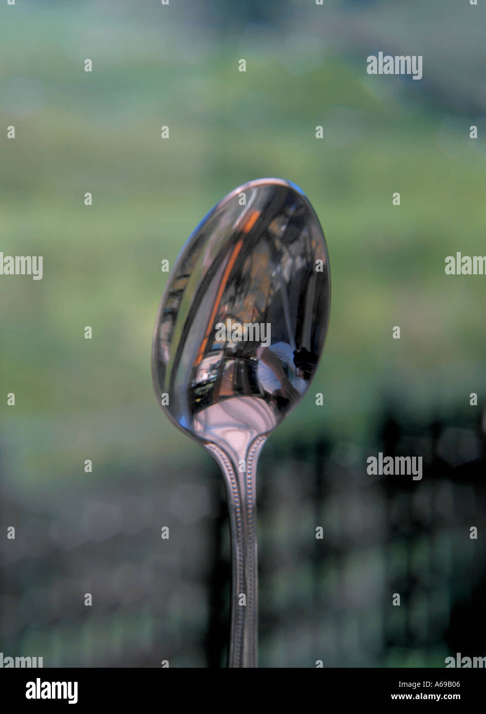 Spoon mirror distorted hi-res stock photography and images - Alamy